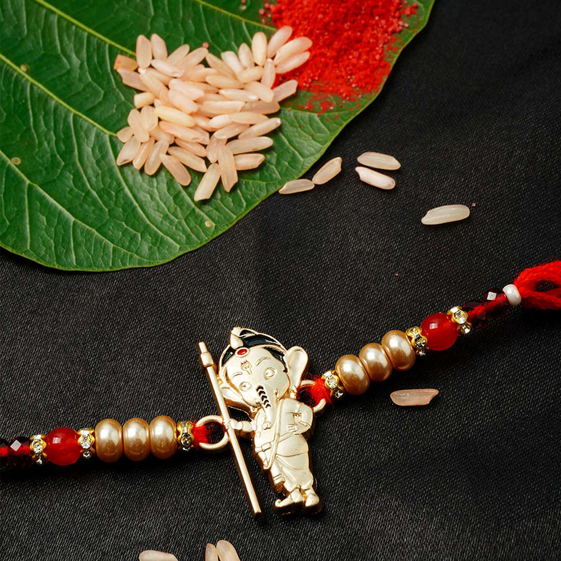 Buy Online Beaded Bal Ganesh Rakhi -Urmika – Ferosh